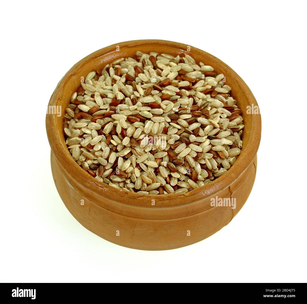 Integral, brown rice pile in a bowl isolated on white background Stock ...