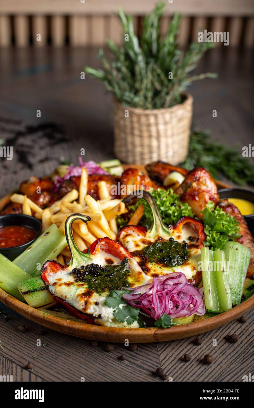 Fried chicken wings and French fries. Menu Stock Photo - Alamy