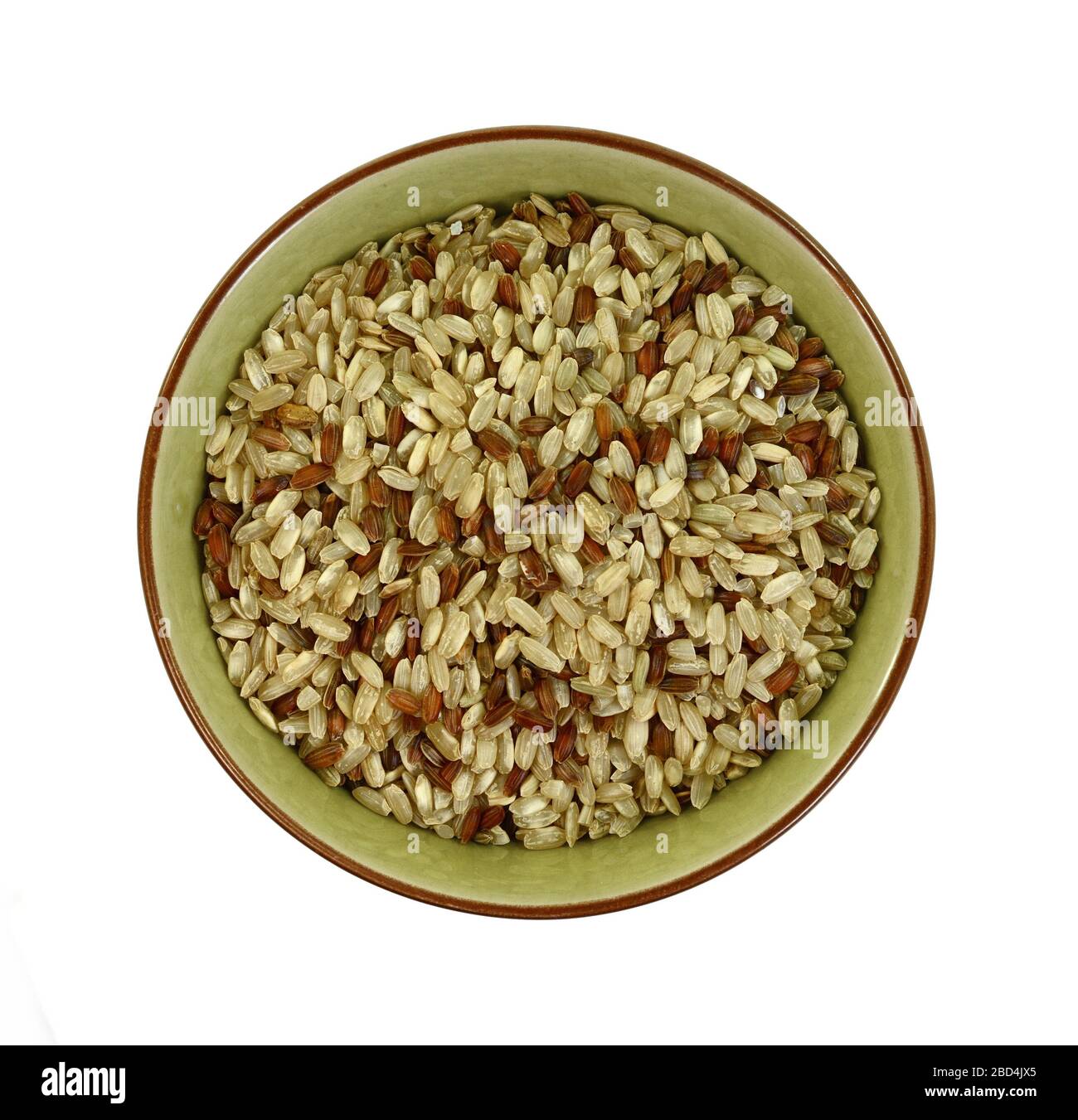 Integral, brown rice pile in a bowl isolated on white background Stock ...