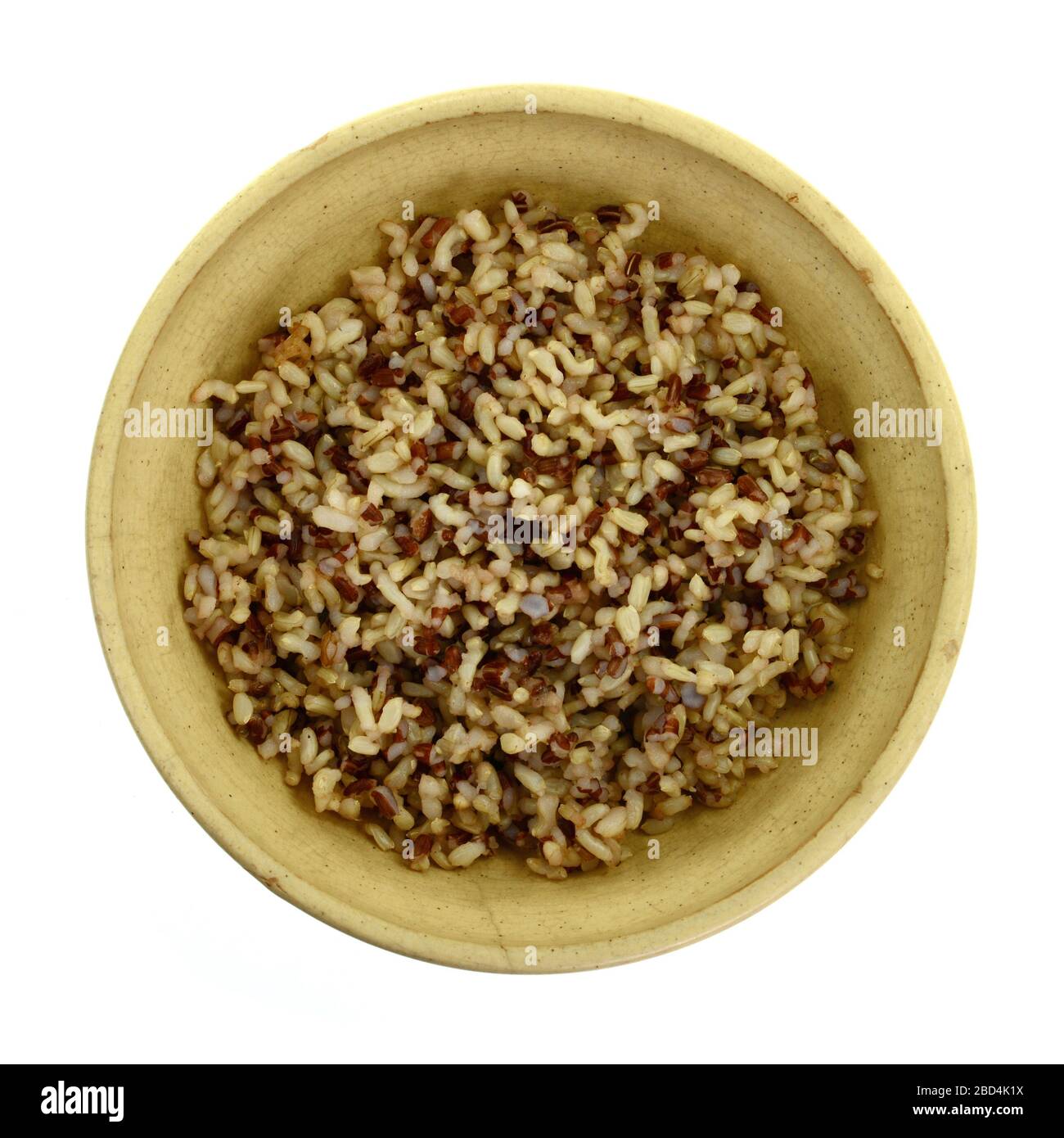 Integral, brown rice pile in a bowl isolated on white background Stock ...