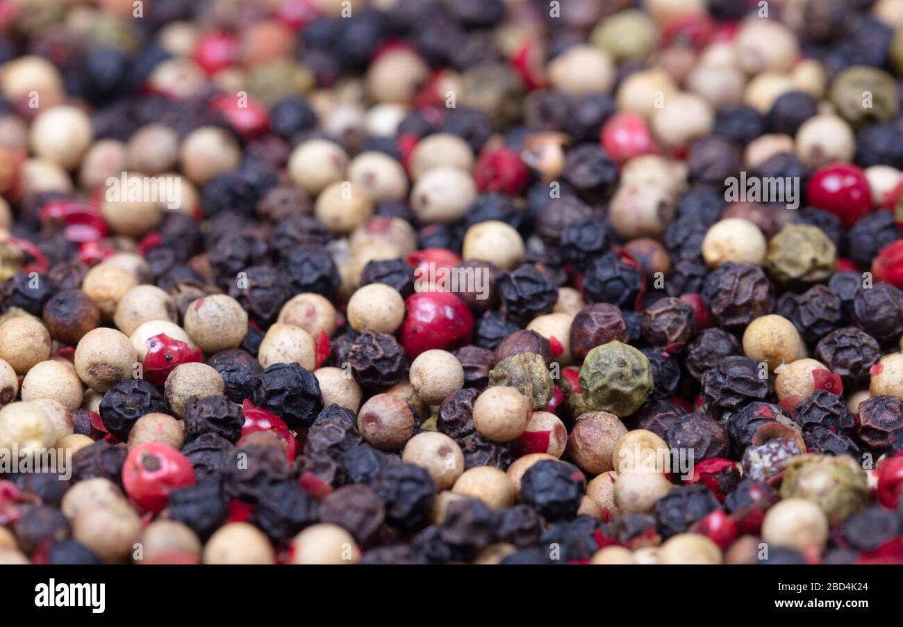 Peper background, white, green, black and red peper Stock Photo - Alamy
