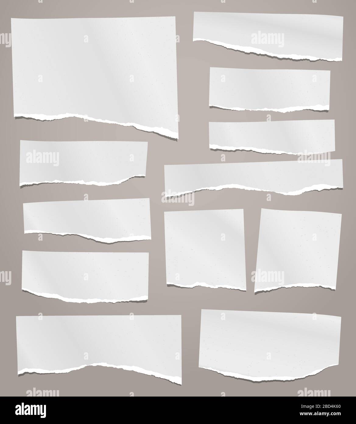 Torn of white note, notebook paper strips, pieces stuck on brown ...