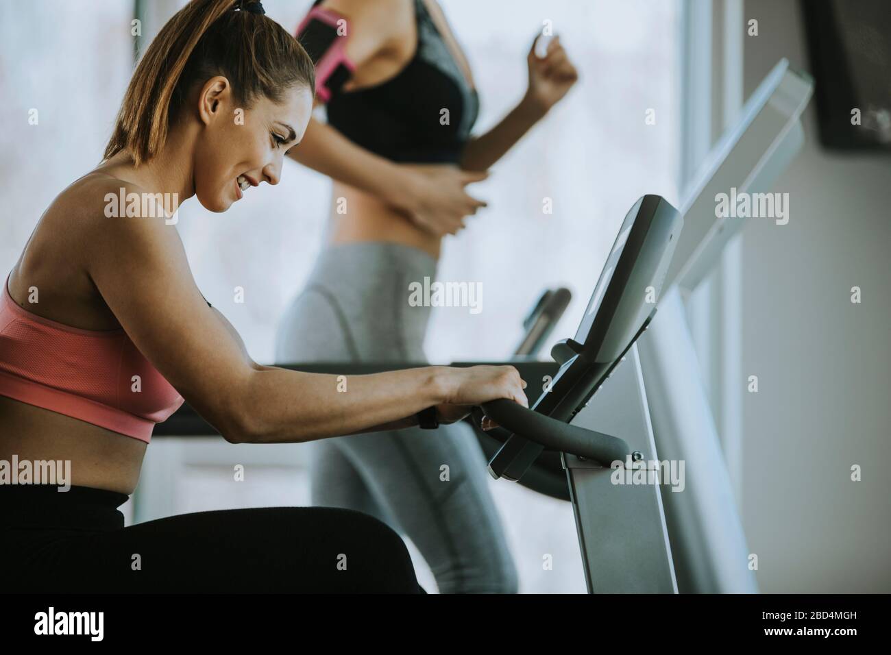 Woman using treadmill hi-res stock photography and images - Alamy