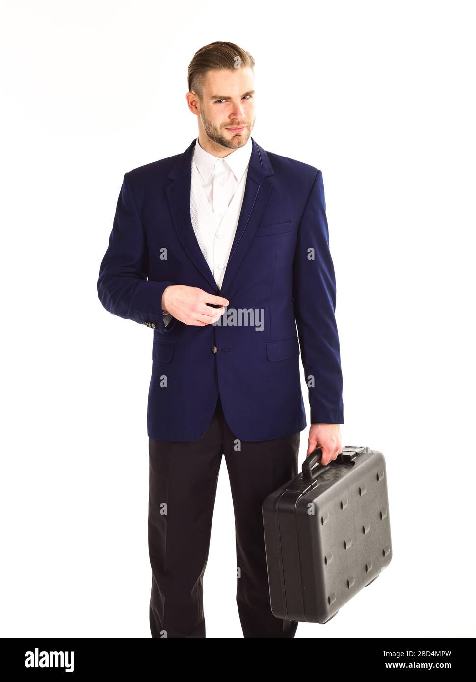 Businessman fastens a button on jacket and holds briefcase. Man carries ...