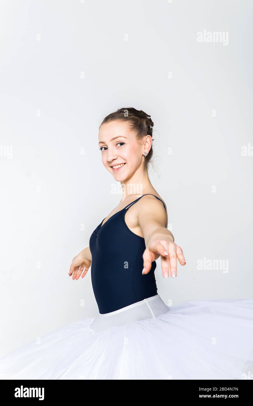 Young ballerina practising ballet moves in the studio Stock Photo - Alamy