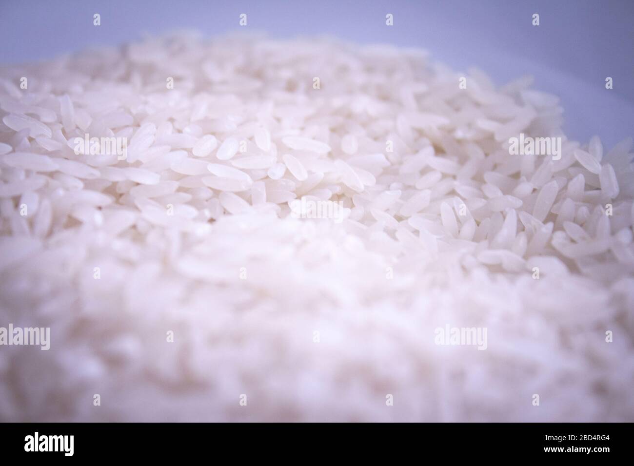 Uncooked white rice. Part of the rice out of focus. No people Stock ...
