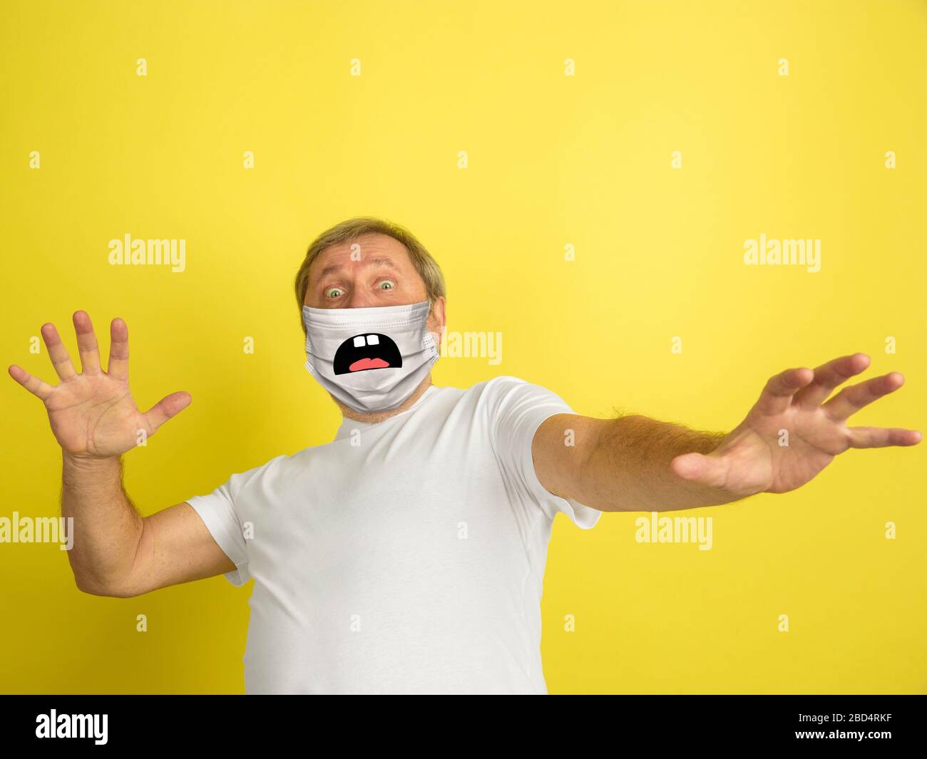 Scared. Portrait of caucasian senior man with emotion on his protective ...