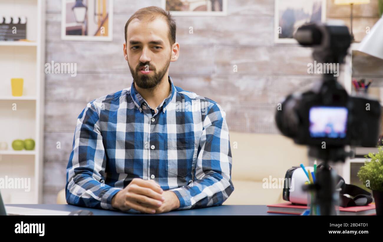 Famous young man recording a vlog for subscribers. Influencer using ...