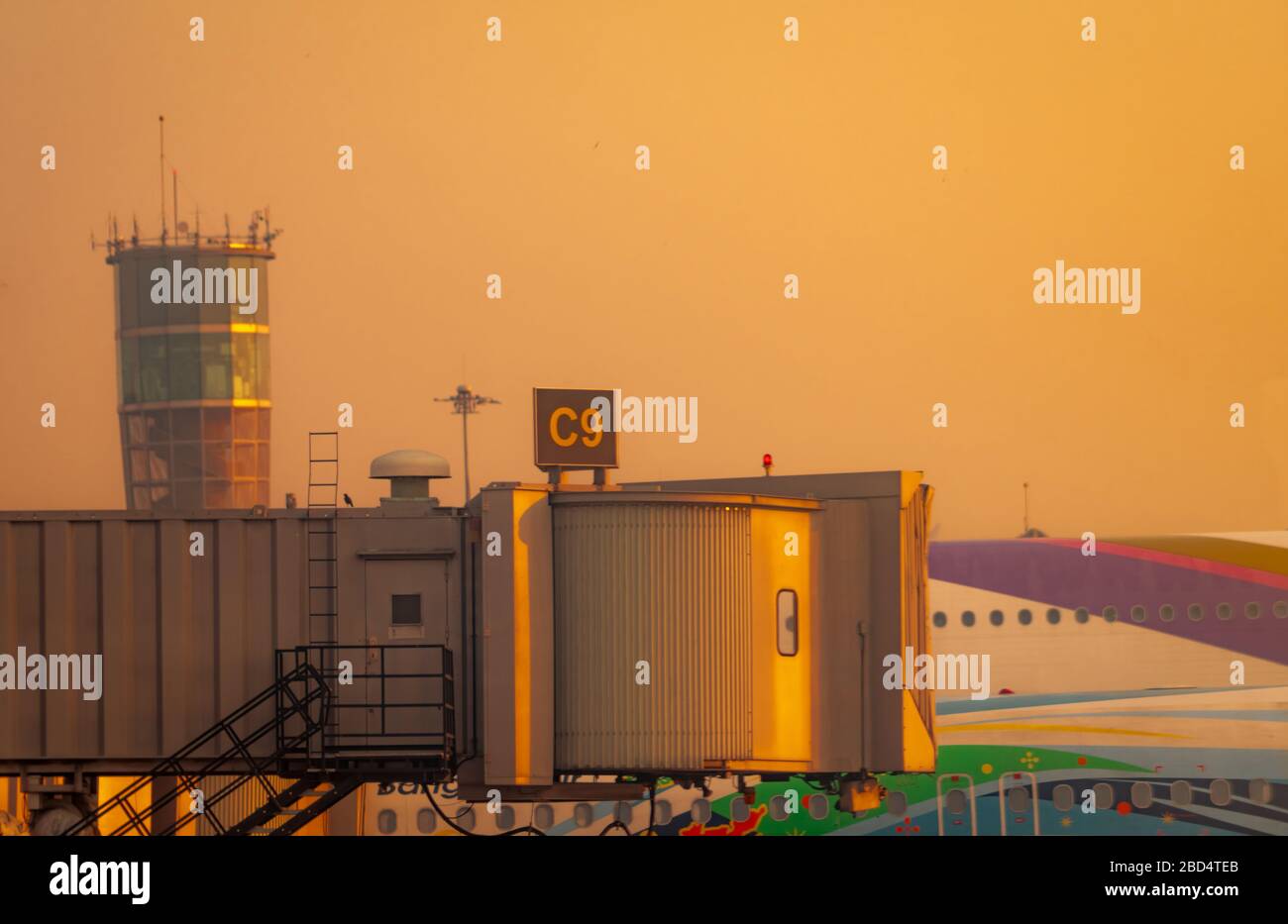 Commercial airplane parked at jet bridge for passenger take off at the ...