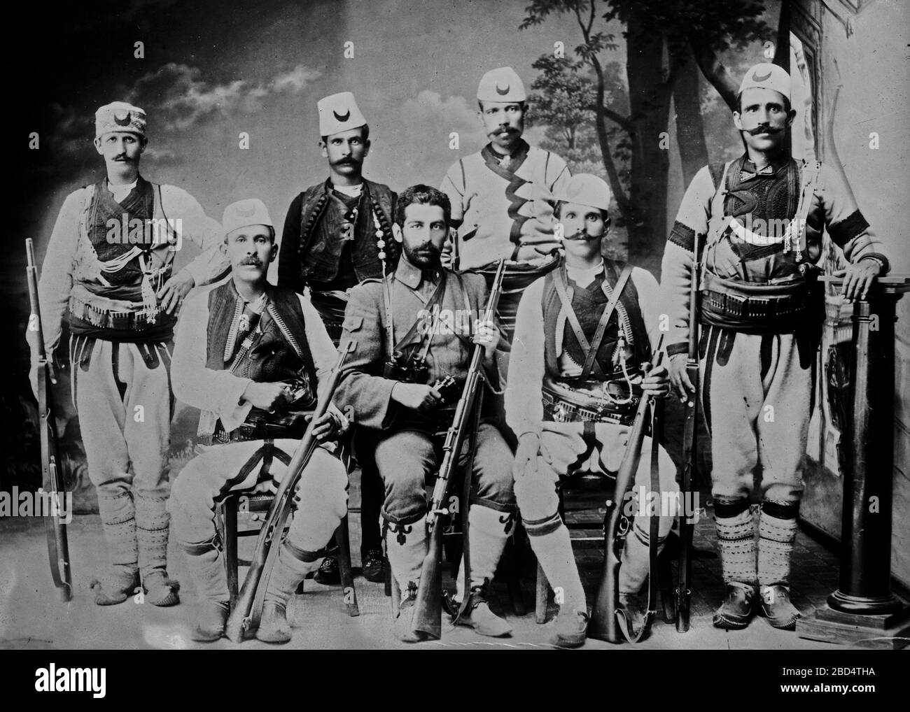 A group of Turkish men (Turks) with rifles posing for a group photo ca ...