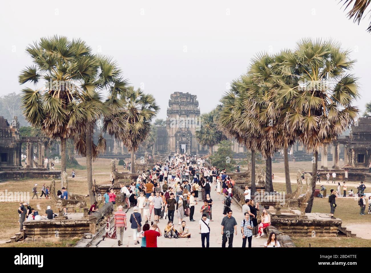 Angkor Wat temple with crowds of visiting tourists Stock Photo - Alamy