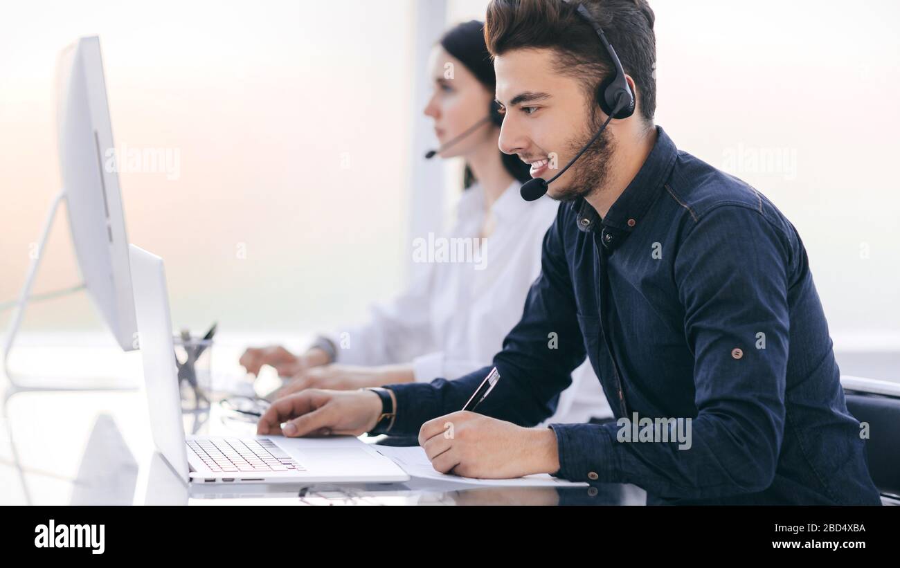 professional call center operators communicate with customers ...
