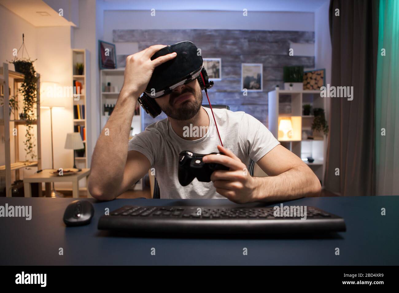 Pov of sad young man after game over at online games on stream using ...