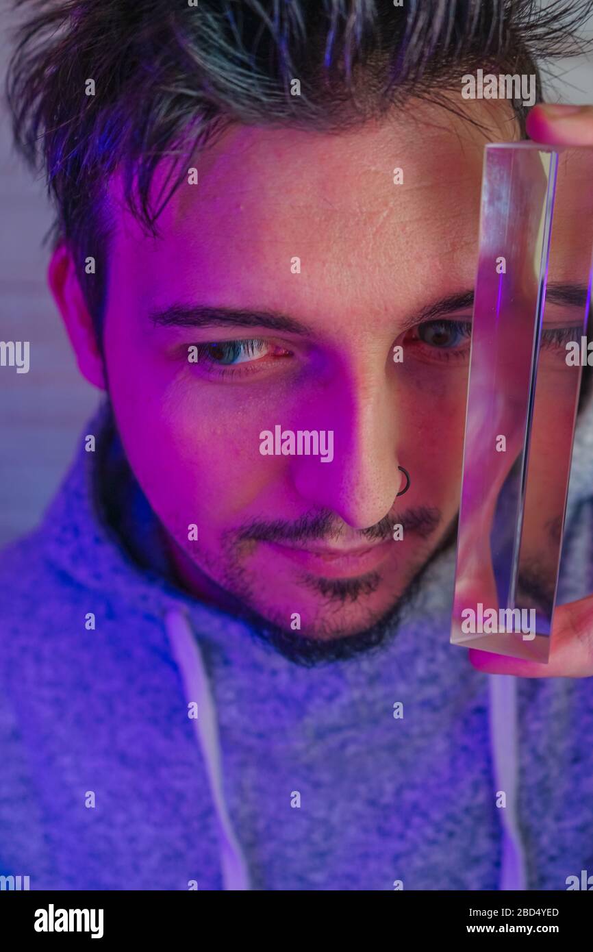 Artistic and futuristic portrait of an attractive young man Stock Photo ...