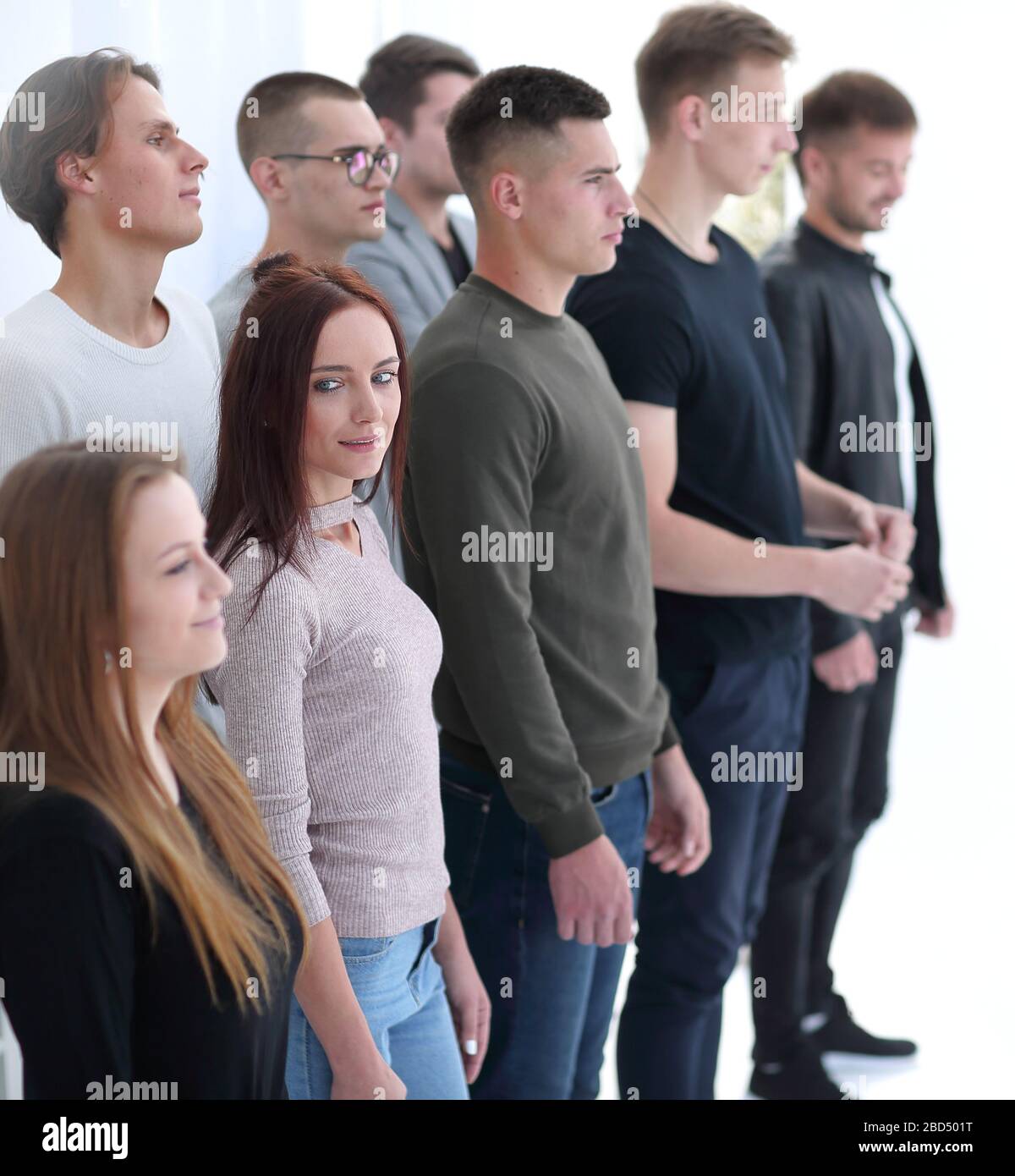 casual young people passing by each other Stock Photo - Alamy