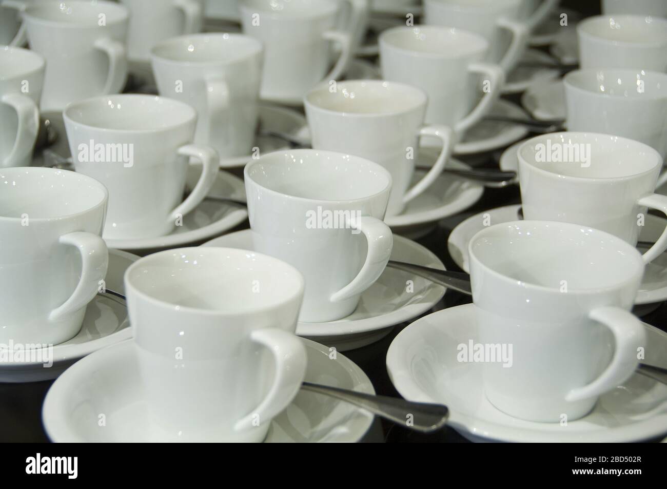 The portrait of still life coffee cups in rows Stock Photo - Alamy