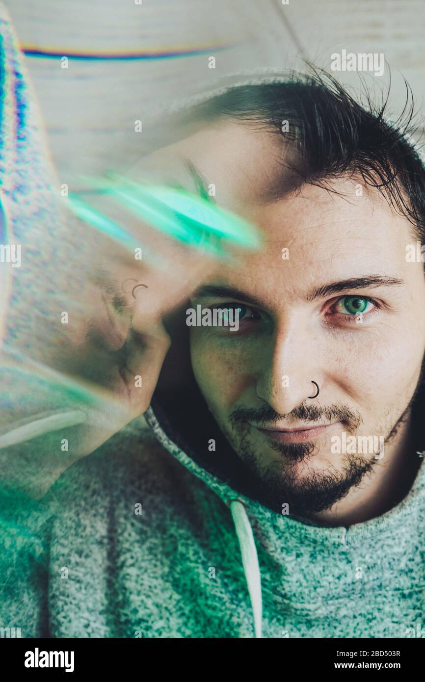 Artistic and futuristic portrait of an attractive young man Stock Photo ...