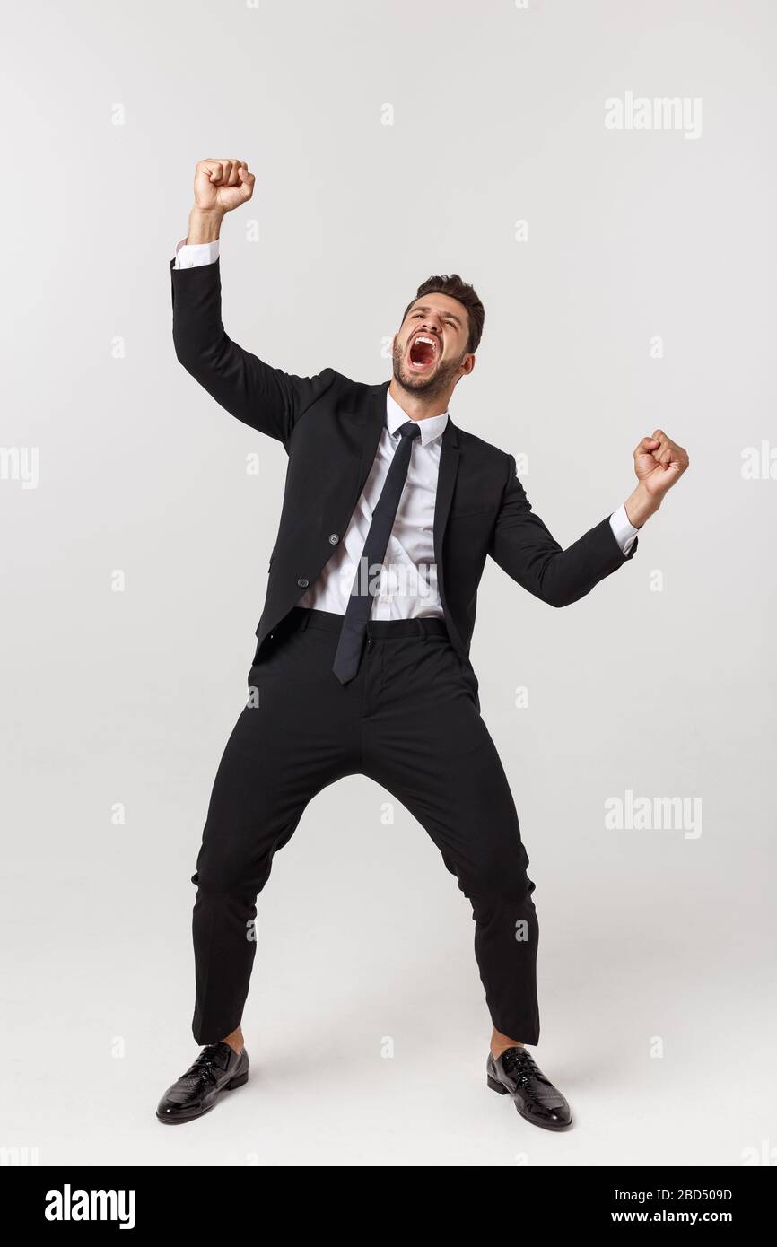 Businessman celebrating success Full Length Portrait isolated on White ...