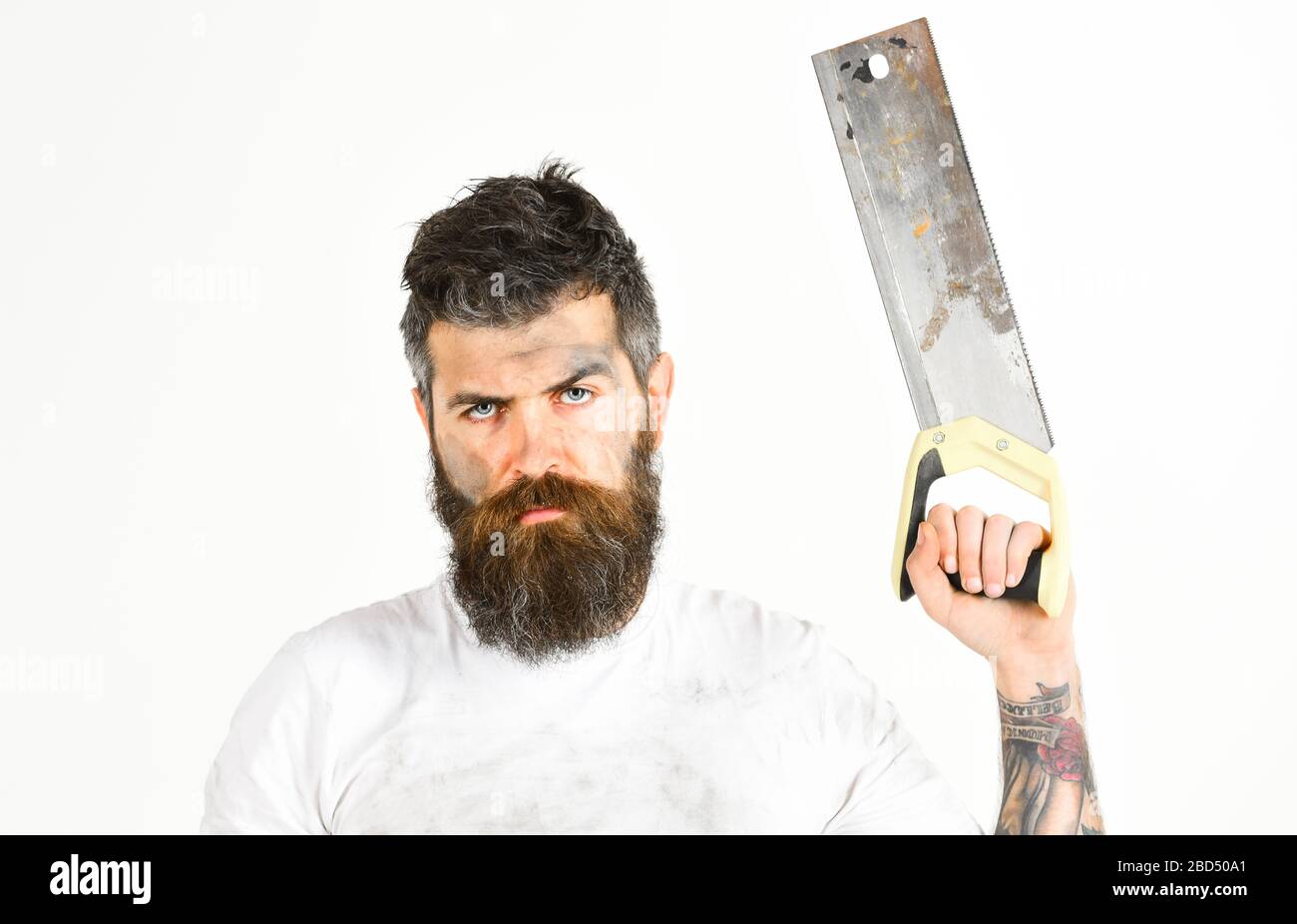 Guy with beard covered with dust. Builder, worker, carpenter, handyman ...