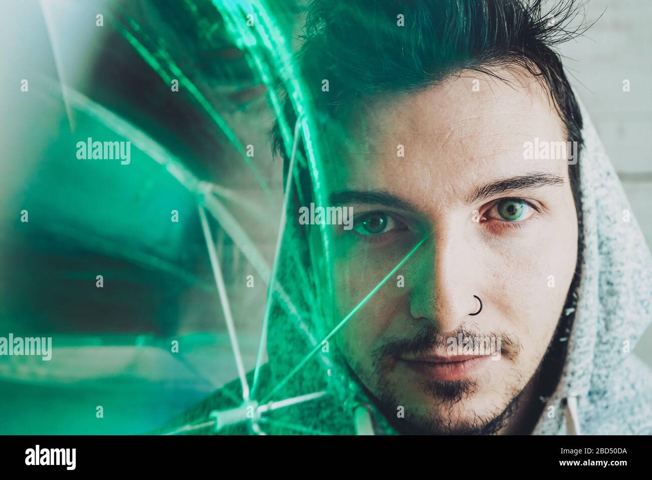 Artistic and futuristic portrait of an attractive young man Stock Photo ...