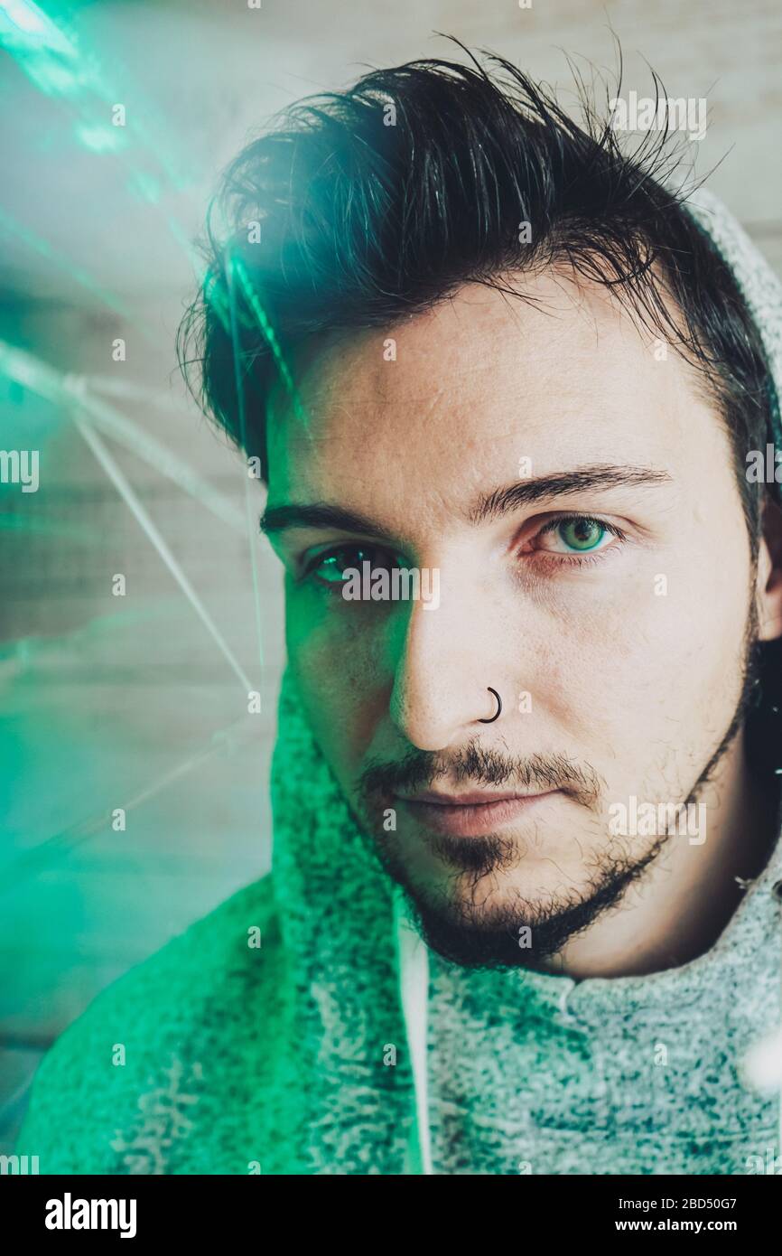 Artistic and futuristic portrait of an attractive young man Stock Photo ...