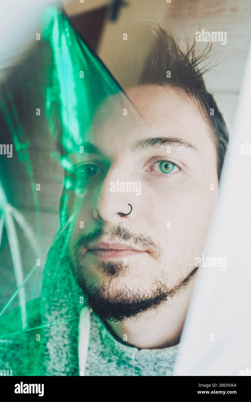 Artistic and futuristic portrait of an attractive young man Stock Photo ...