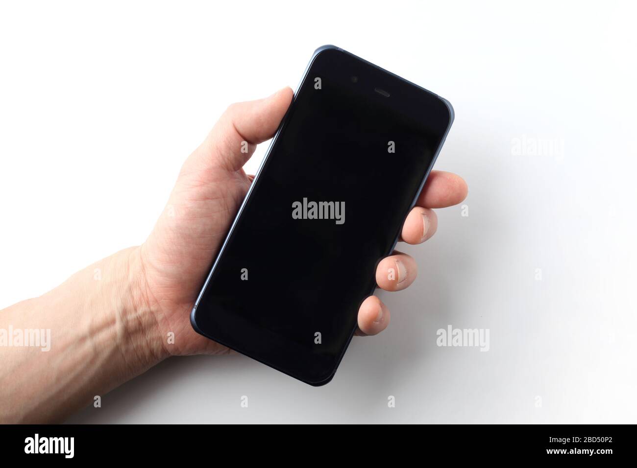 smart phone held in a male hand on white background Stock Photo - Alamy