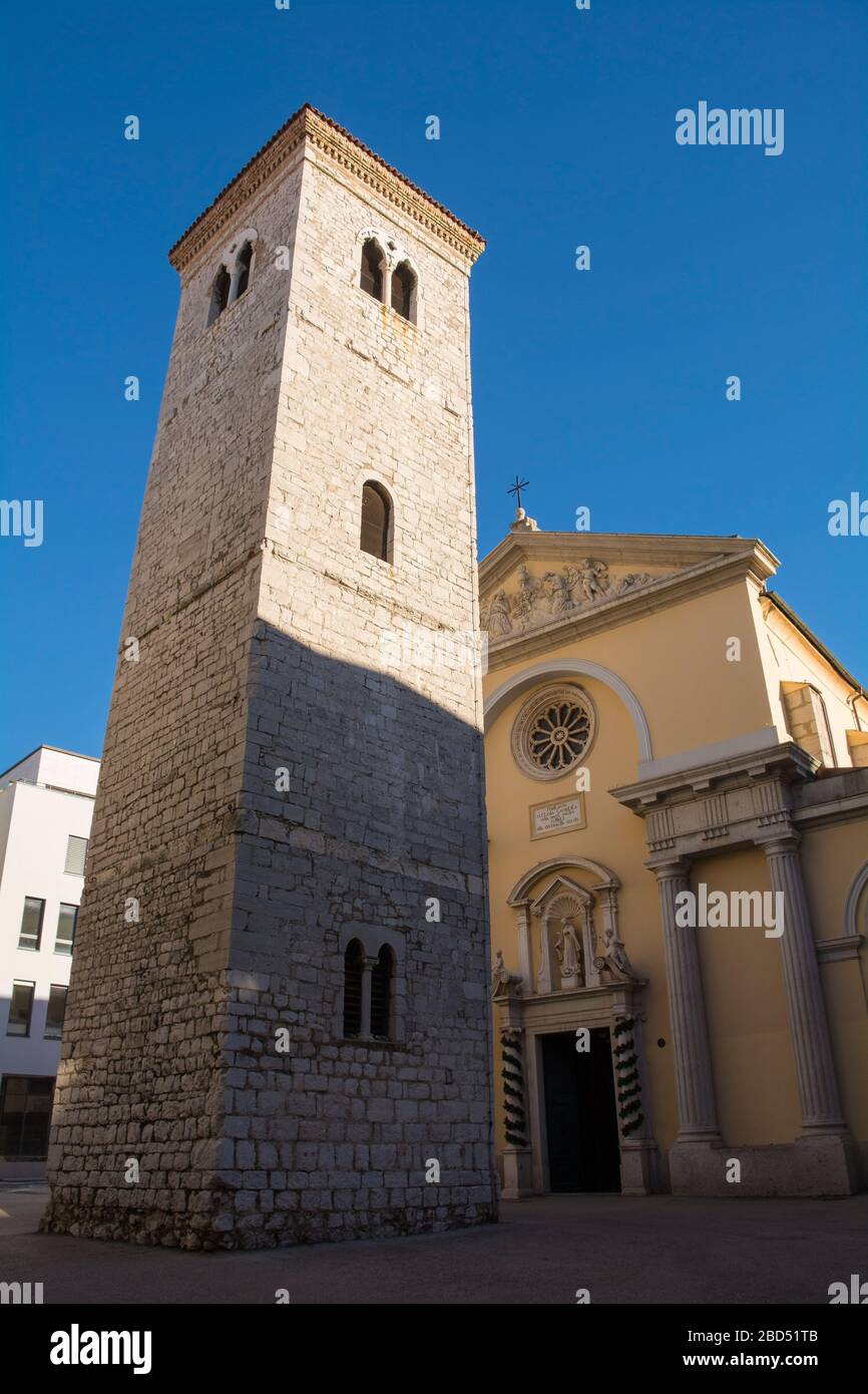 The Church of the Assumption of the Blessed Mary and the leaning tower ...