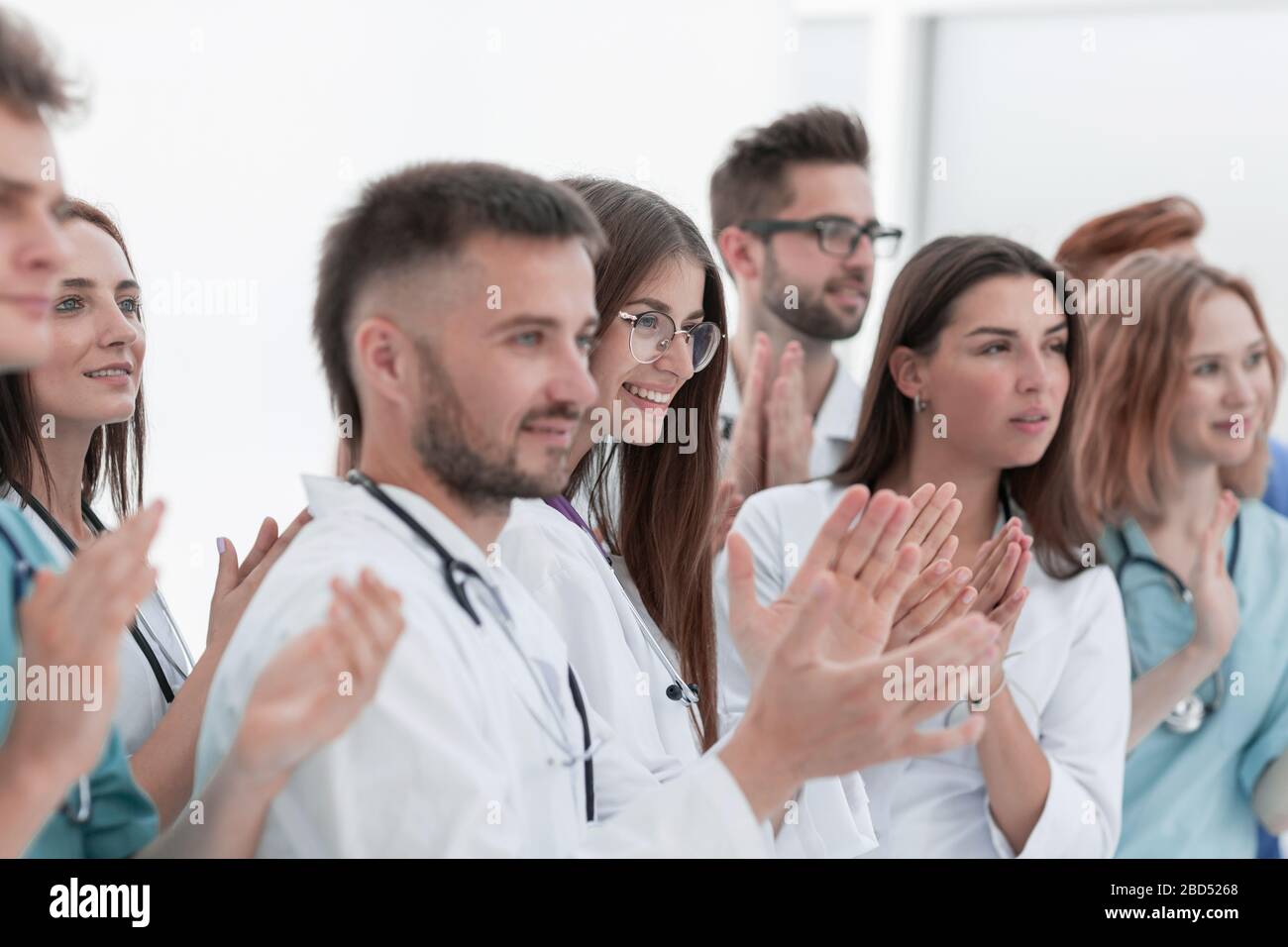 Group doctors applauding together hi-res stock photography and images ...