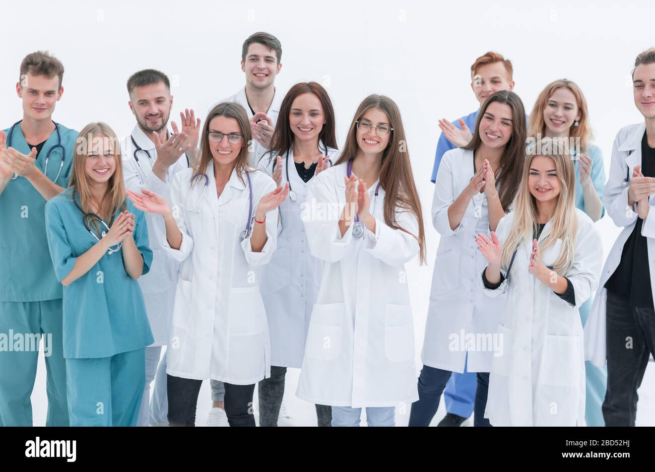 smiling chief doctor standing in front of his colleagues Stock Photo ...