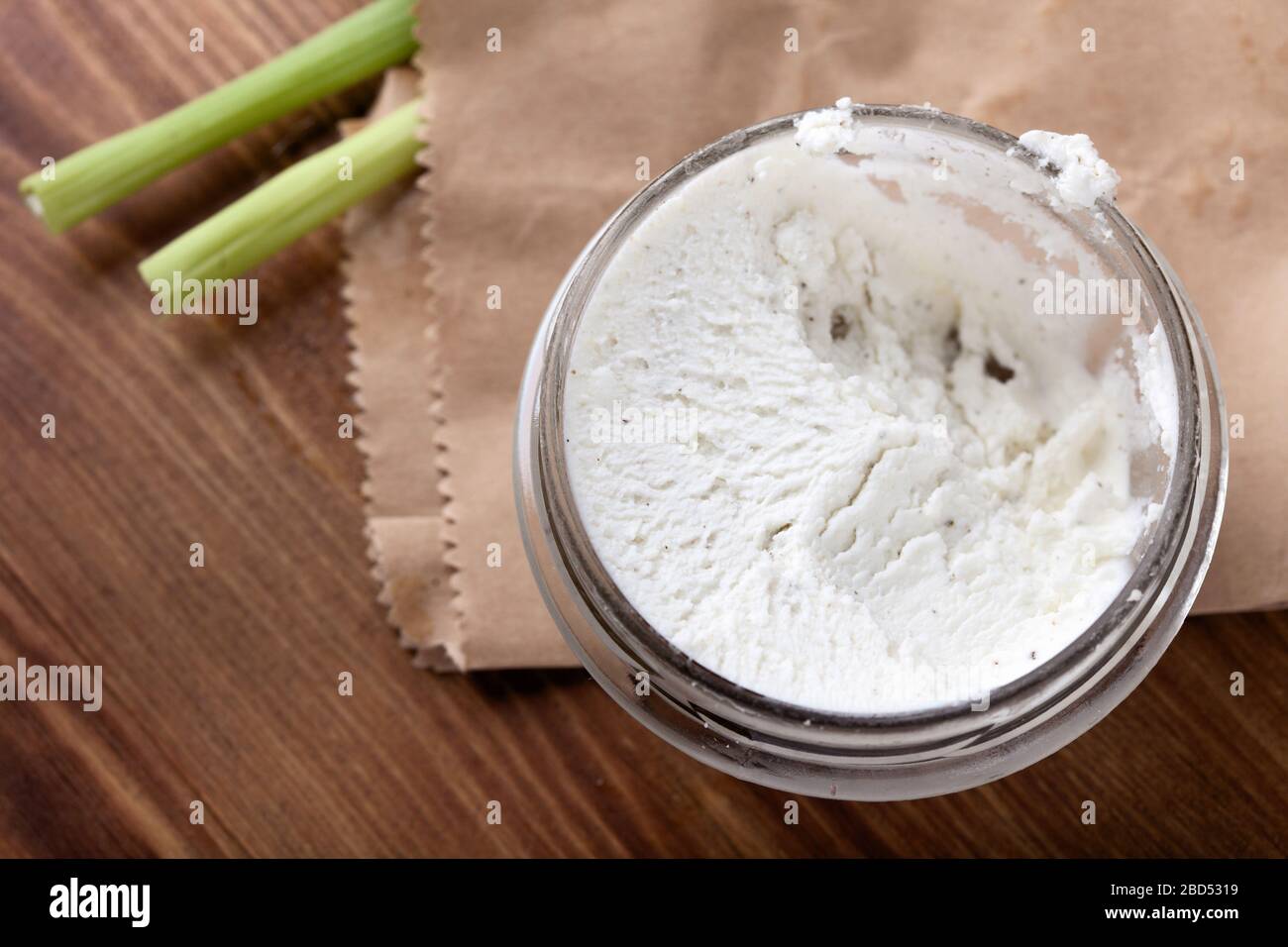 goat cheese in an open glass jar Stock Photo - Alamy