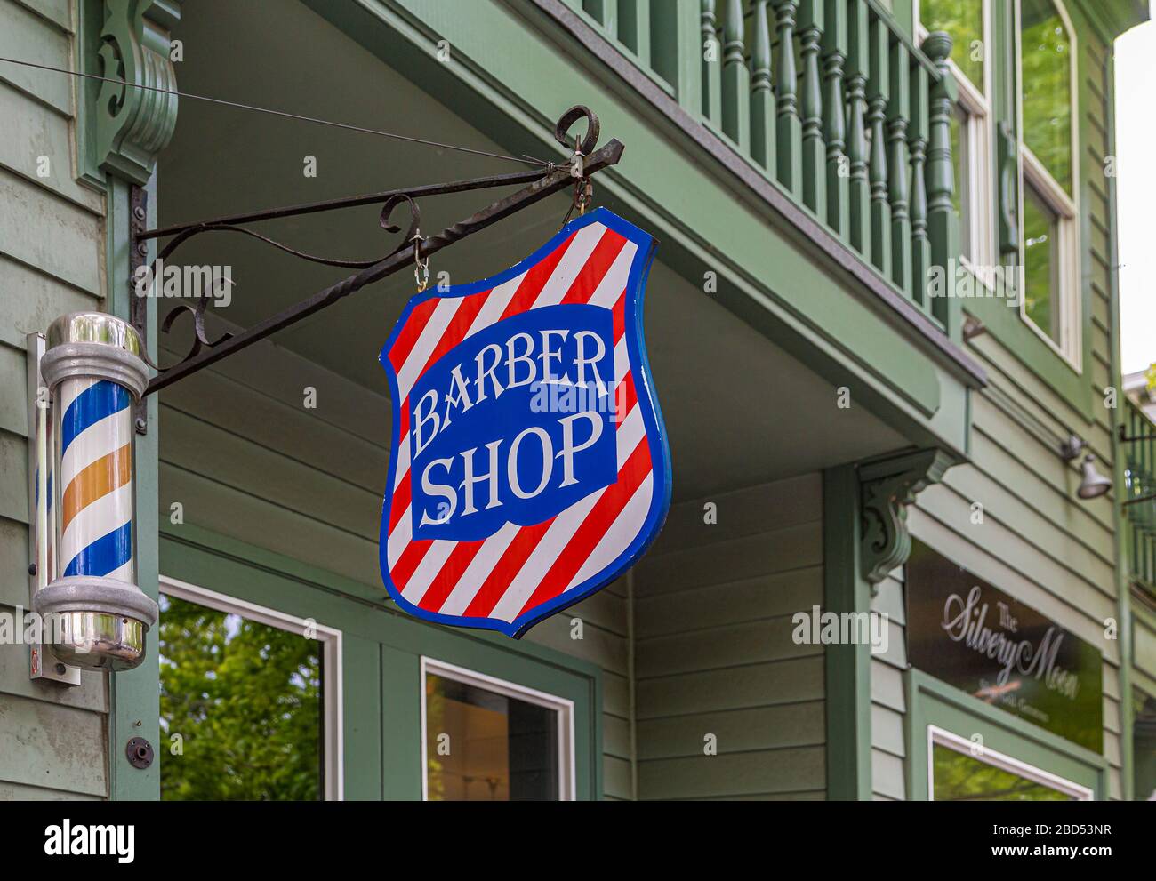 Classic Barber Shop Pole and Sign Stock Photo - Alamy