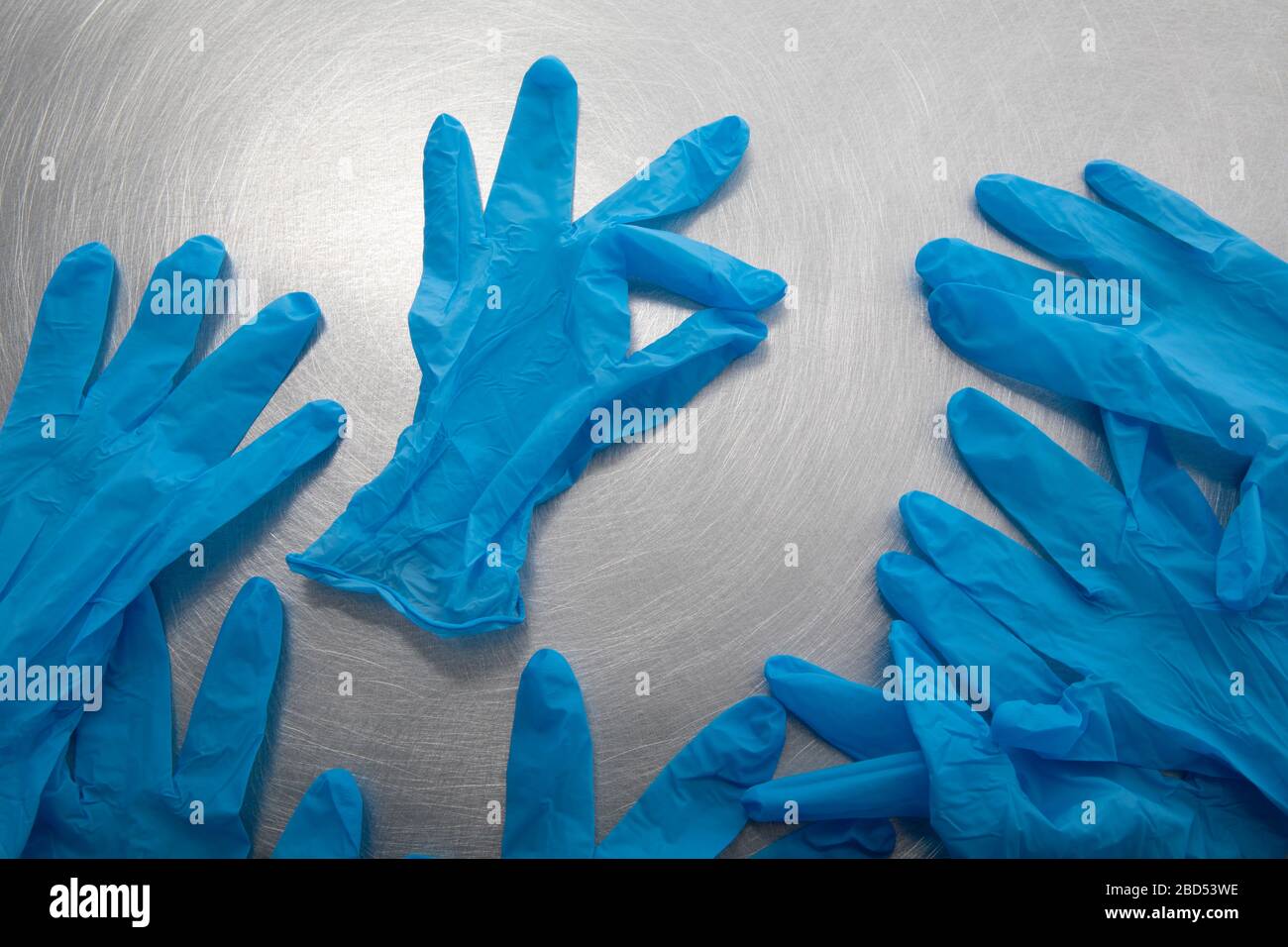 Blue gloves health protection hi-res stock photography and images - Alamy