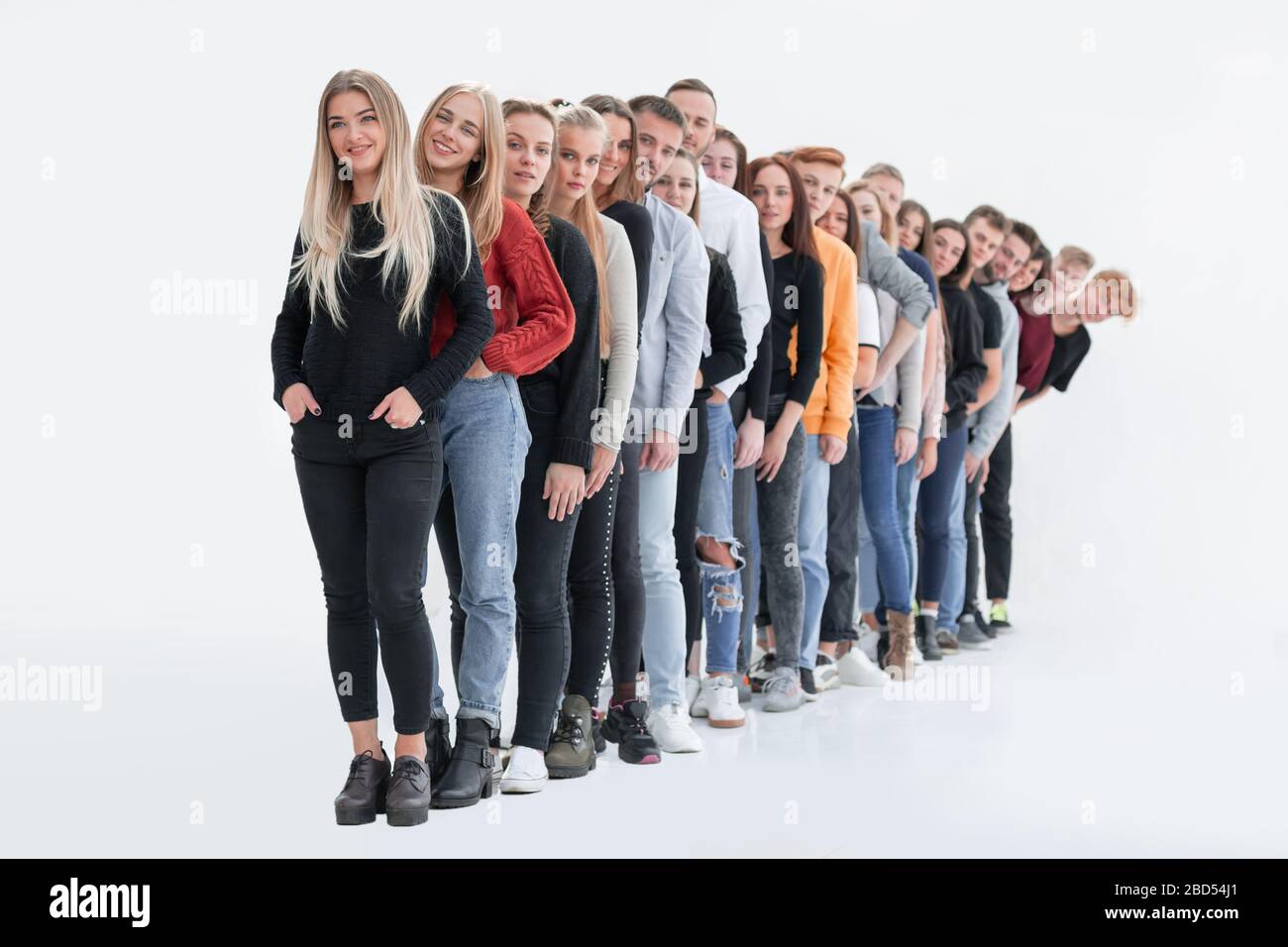 group of diverse young people standing in line Stock Photo - Alamy