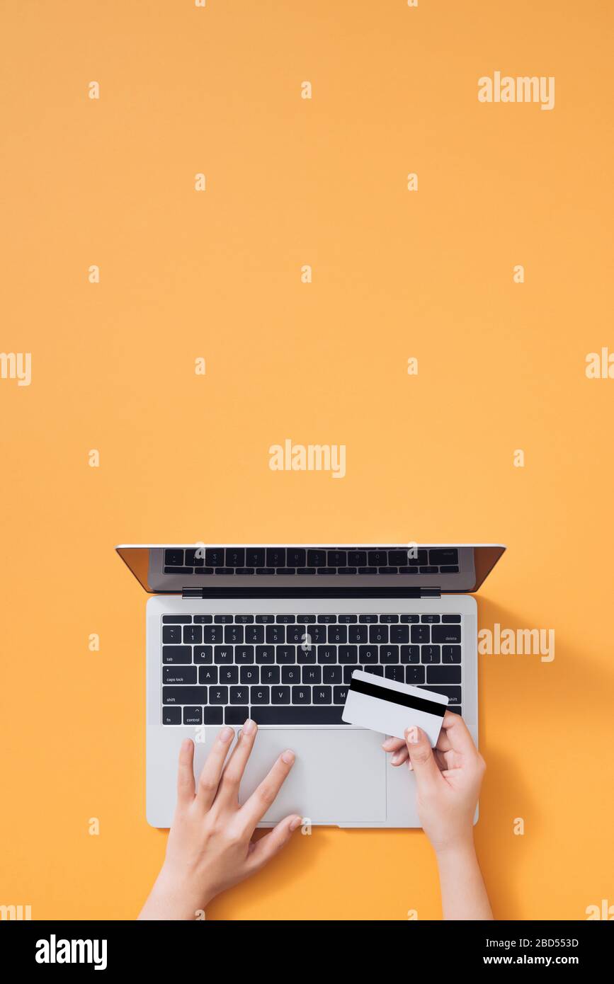Top view of fashion office desk with credit card for online payment on ...
