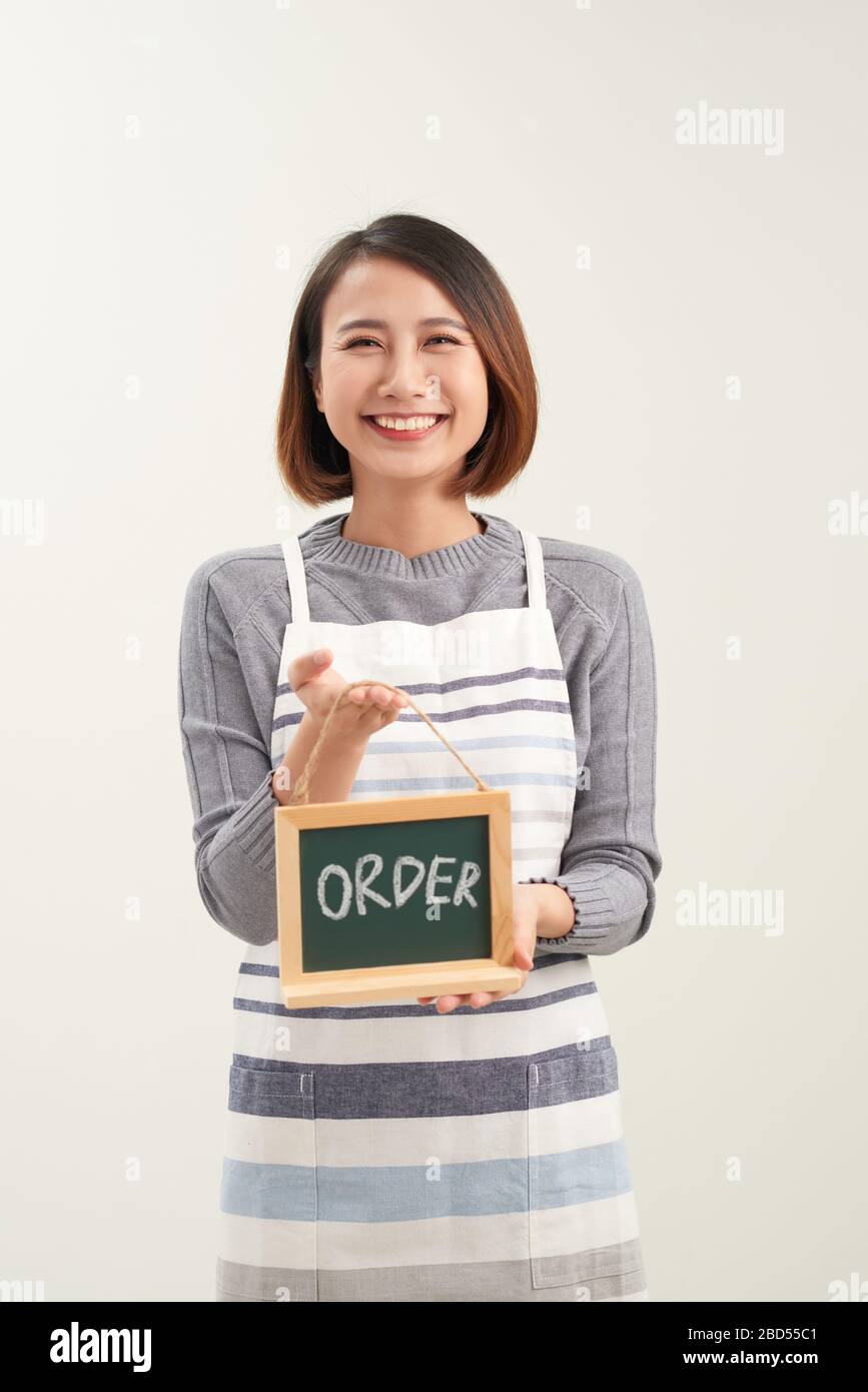 Waitress holding the chalkboard order sign on white background Stock ...