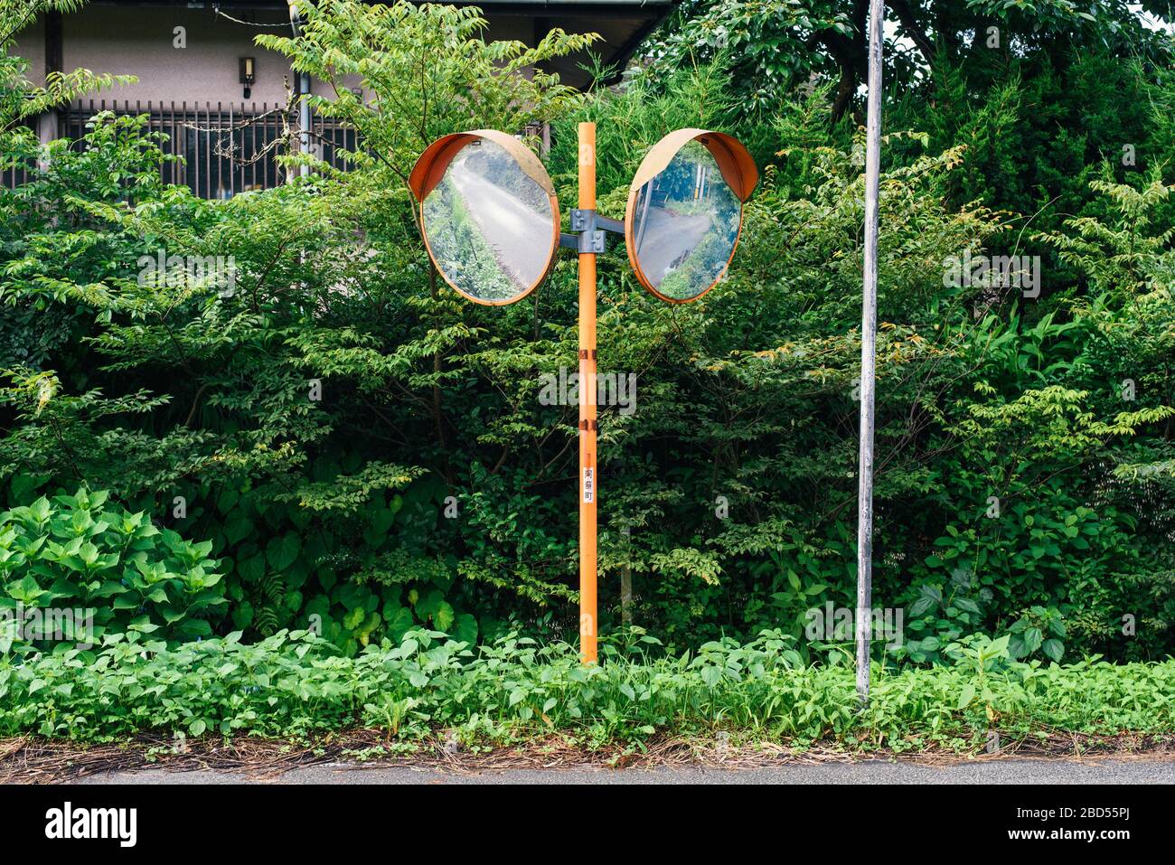 Japanese traffic mirror on country road in Kumamoto, Japan Stock Photo ...