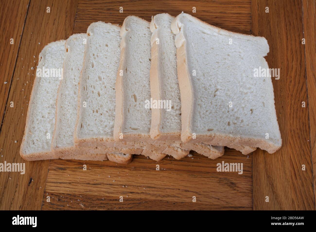 Six slices of plain white bread photographed in a kitchen setting Stock ...