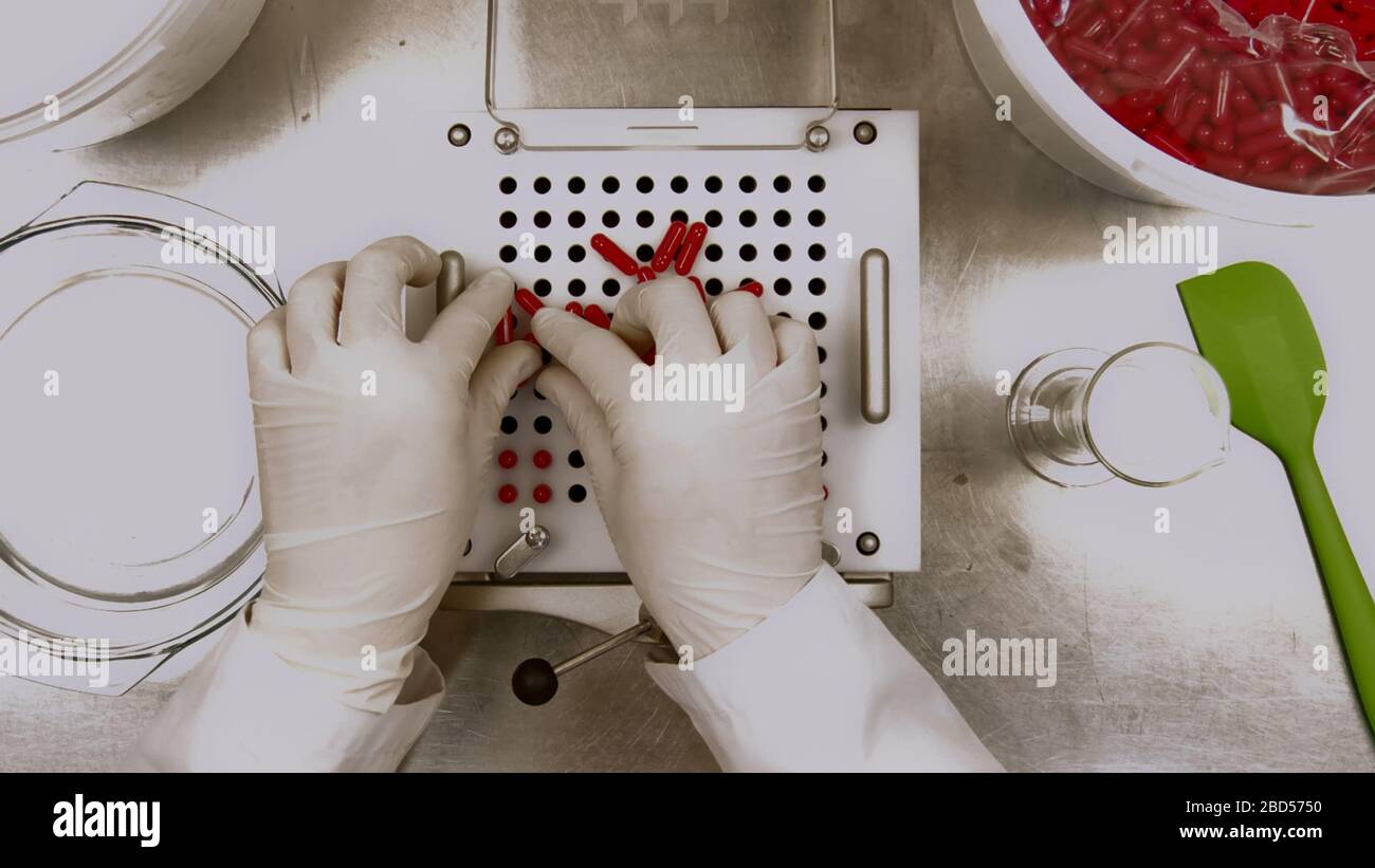 Compounding machine hi-res stock photography and images - Alamy