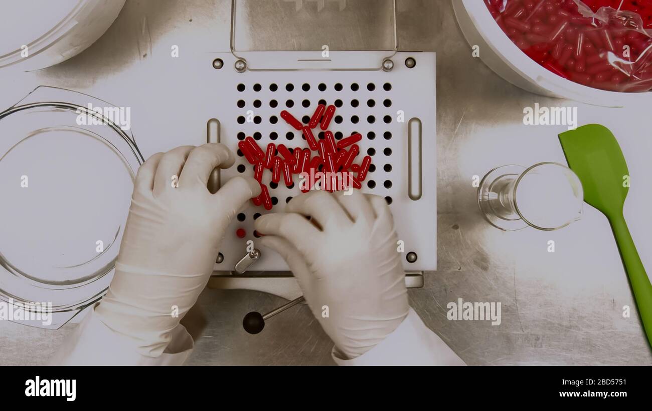 Pill making machine hi-res stock photography and images - Alamy