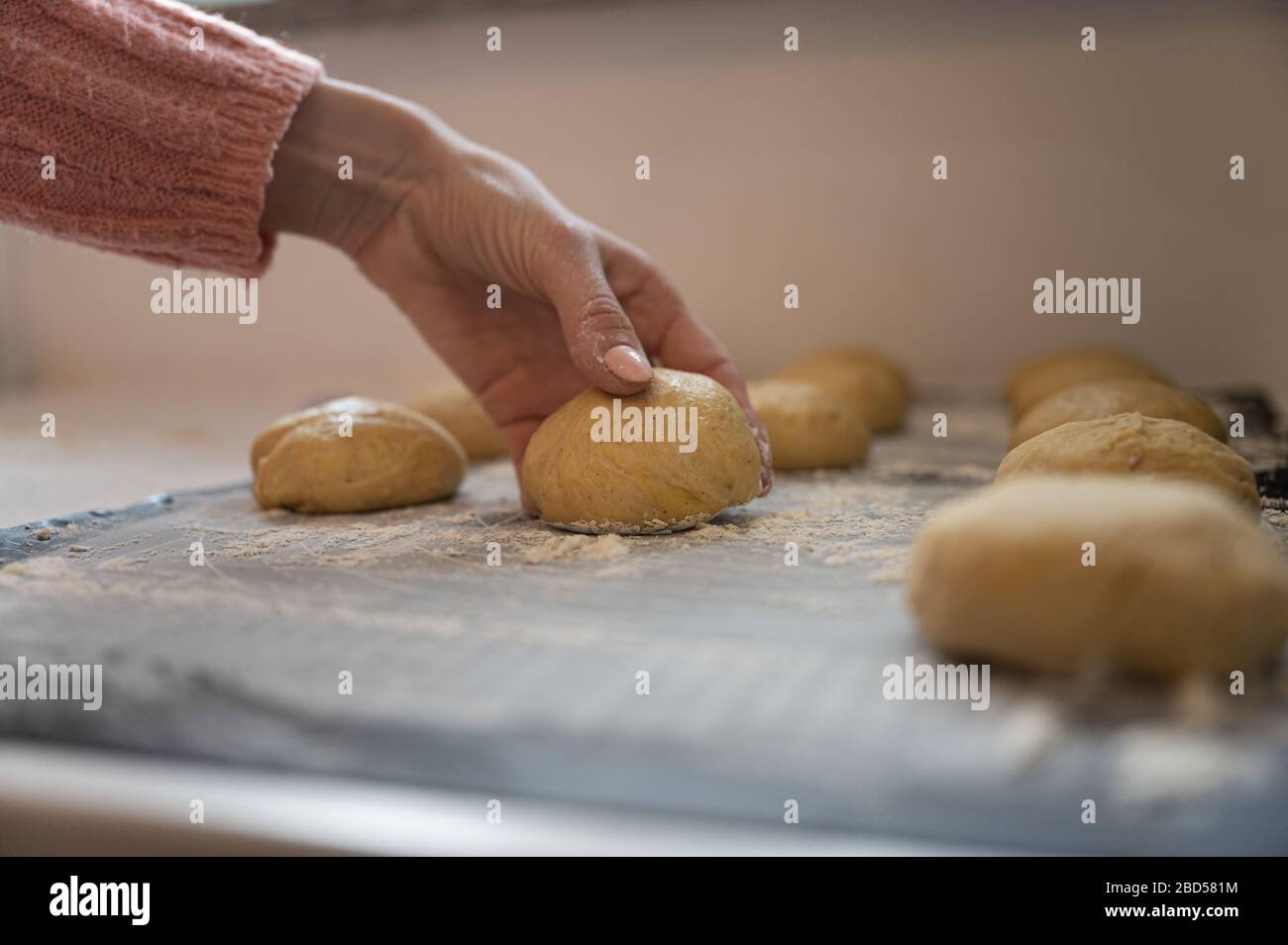 Placing dough on floured counter hi-res stock photography and images ...