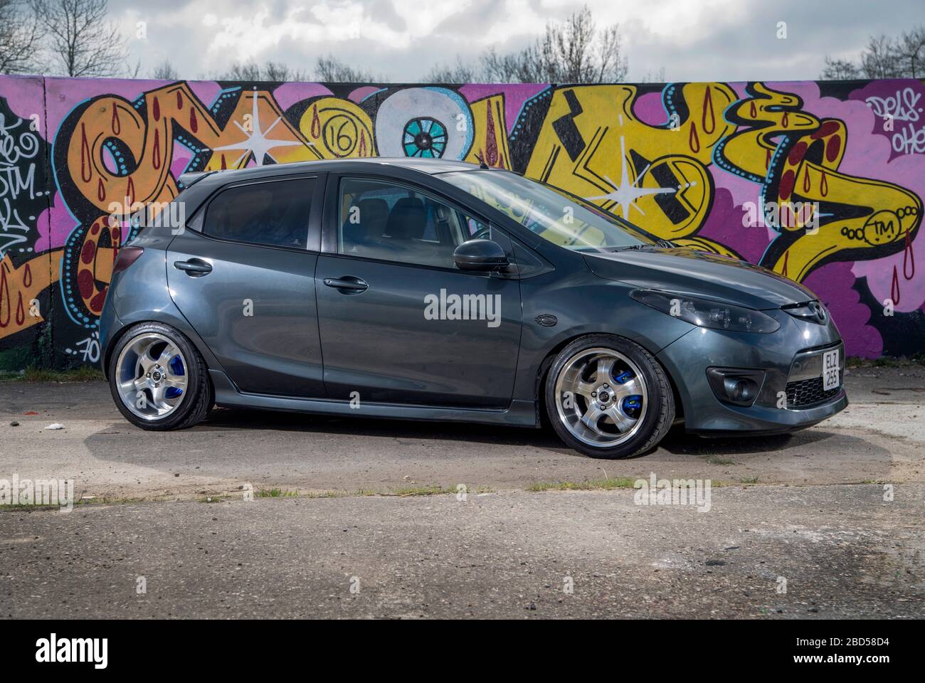 Modified Madza 2 compact car Stock Photo - Alamy