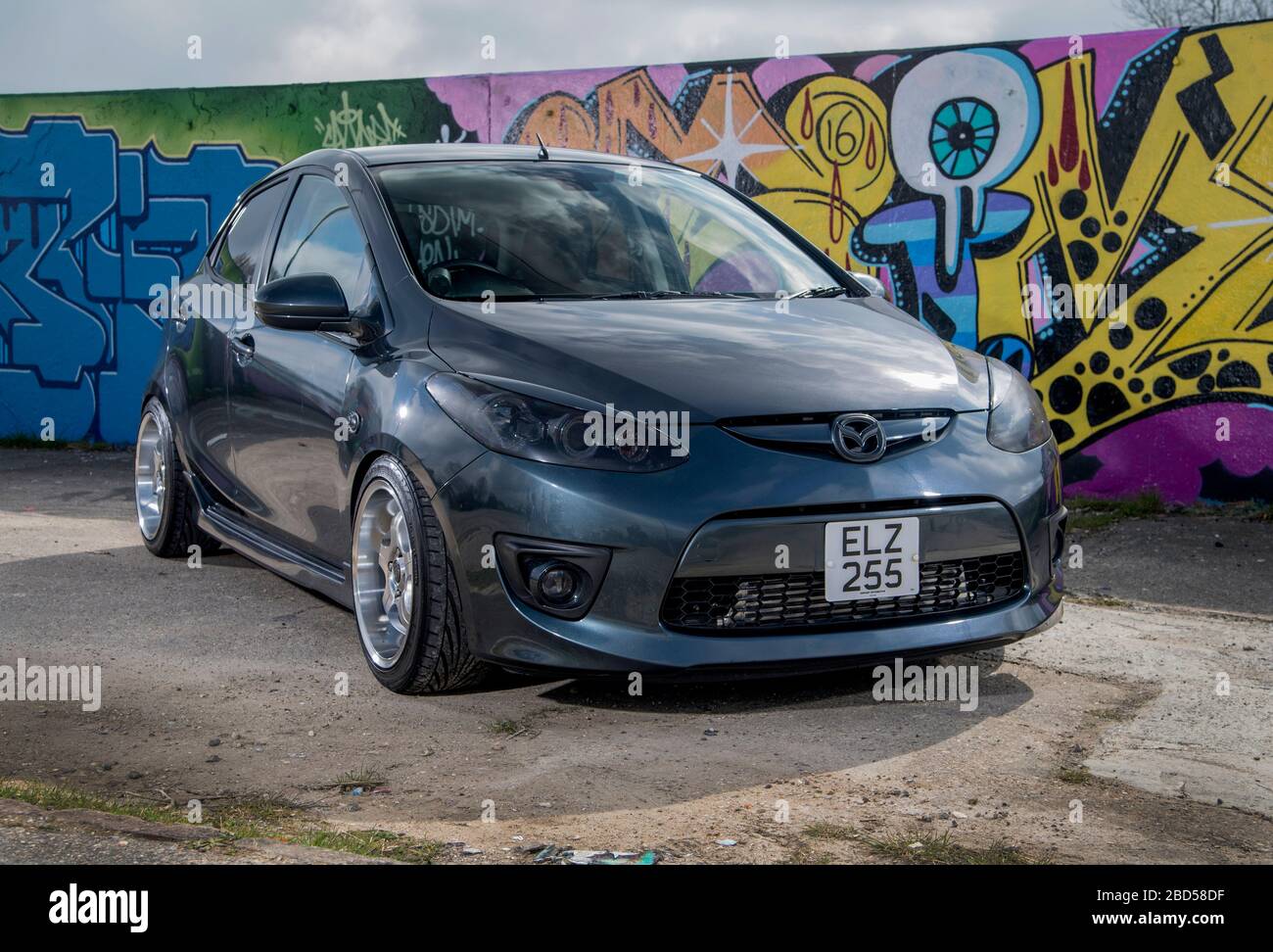 Modified Madza 2 compact car Stock Photo - Alamy