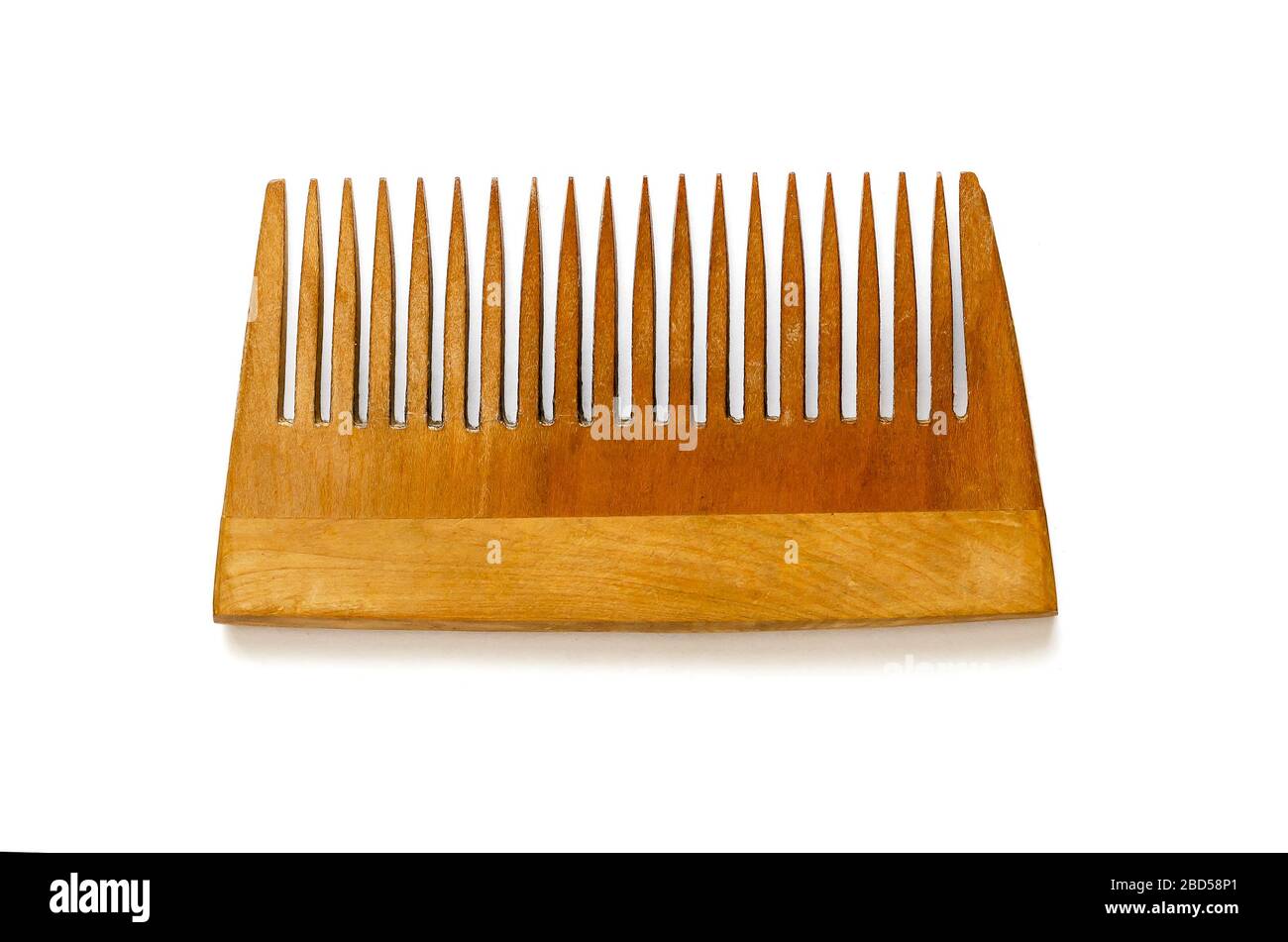 Wooden hair comb on white background. Natural brown wooden comb for ...