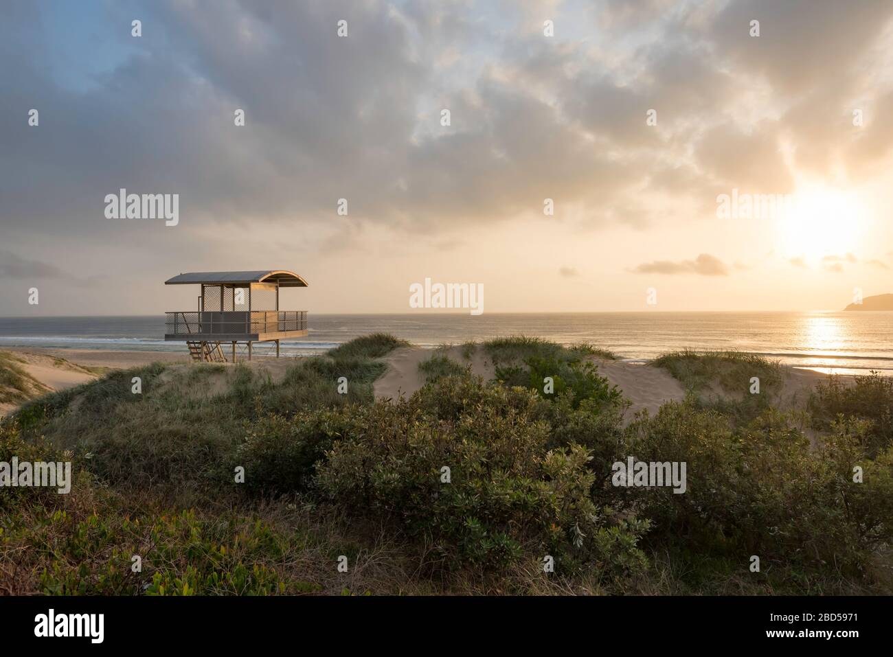 A lifeguard station in the early morning sun at Bennetts Beach, Hawks ...