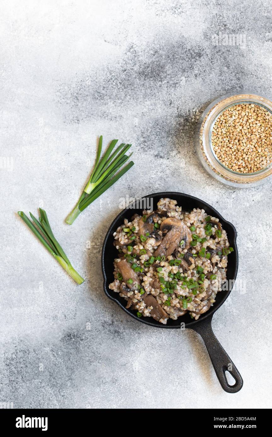Buckwheat with mushrooms and green onions. A traditional Eastern ...