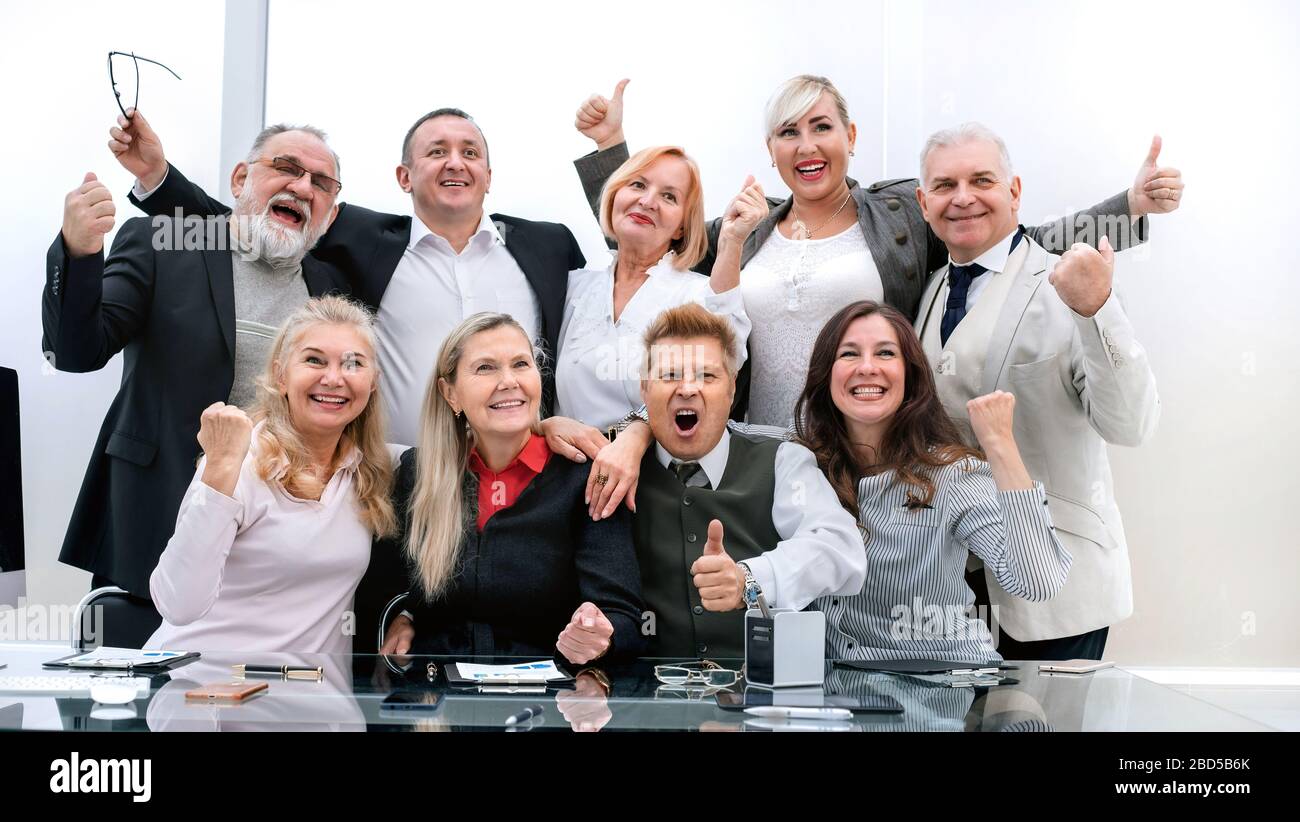happy group of professional professionals showing thumbs up Stock Photo ...