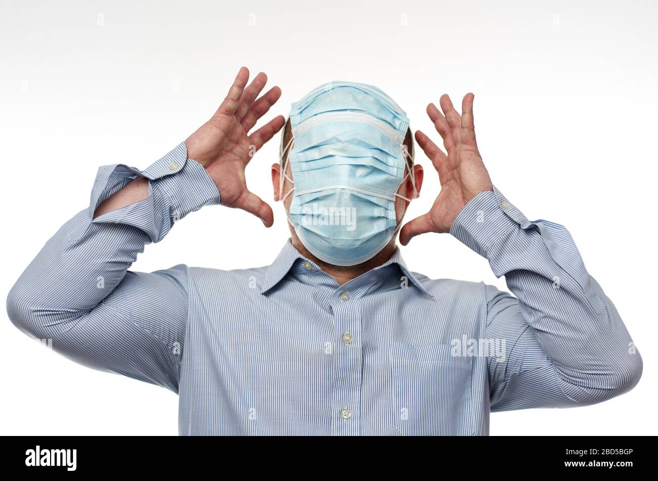 Man with exaggerated mask protection, whole face covered, making him ...