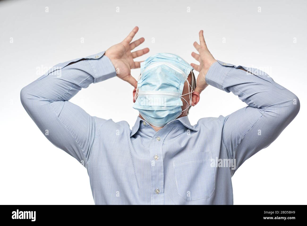 Man with exaggerated mask protection, whole face covered, making him ...