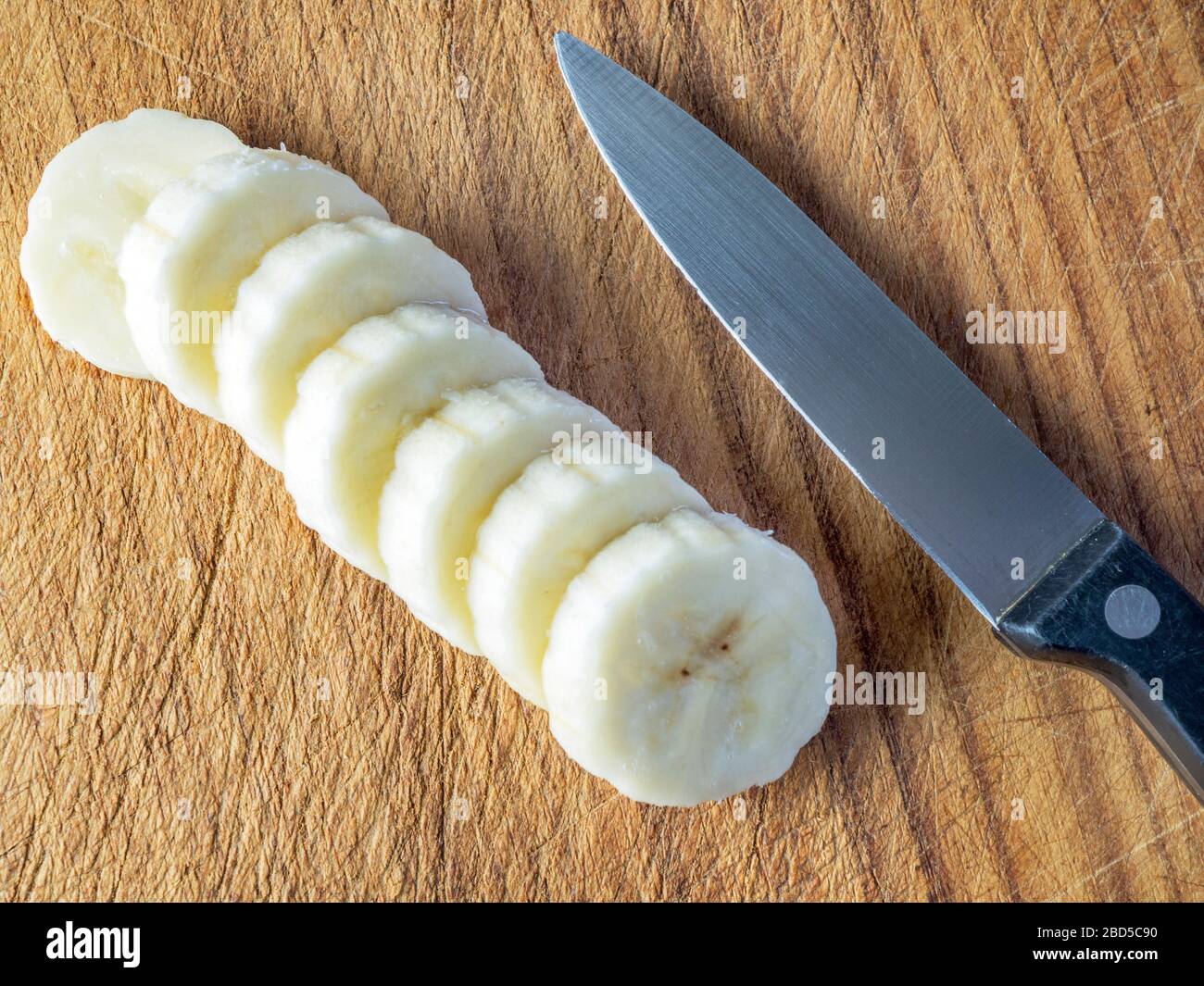 Banana on a board hi-res stock photography and images - Alamy